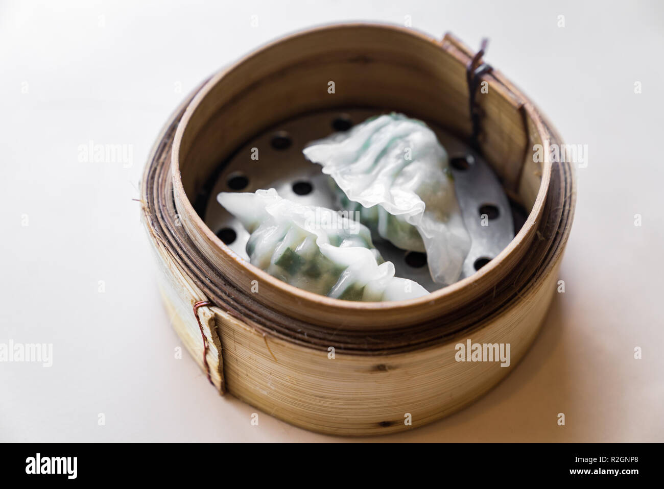 Chinese dim sum in wooden basket Stock Photo - Alamy