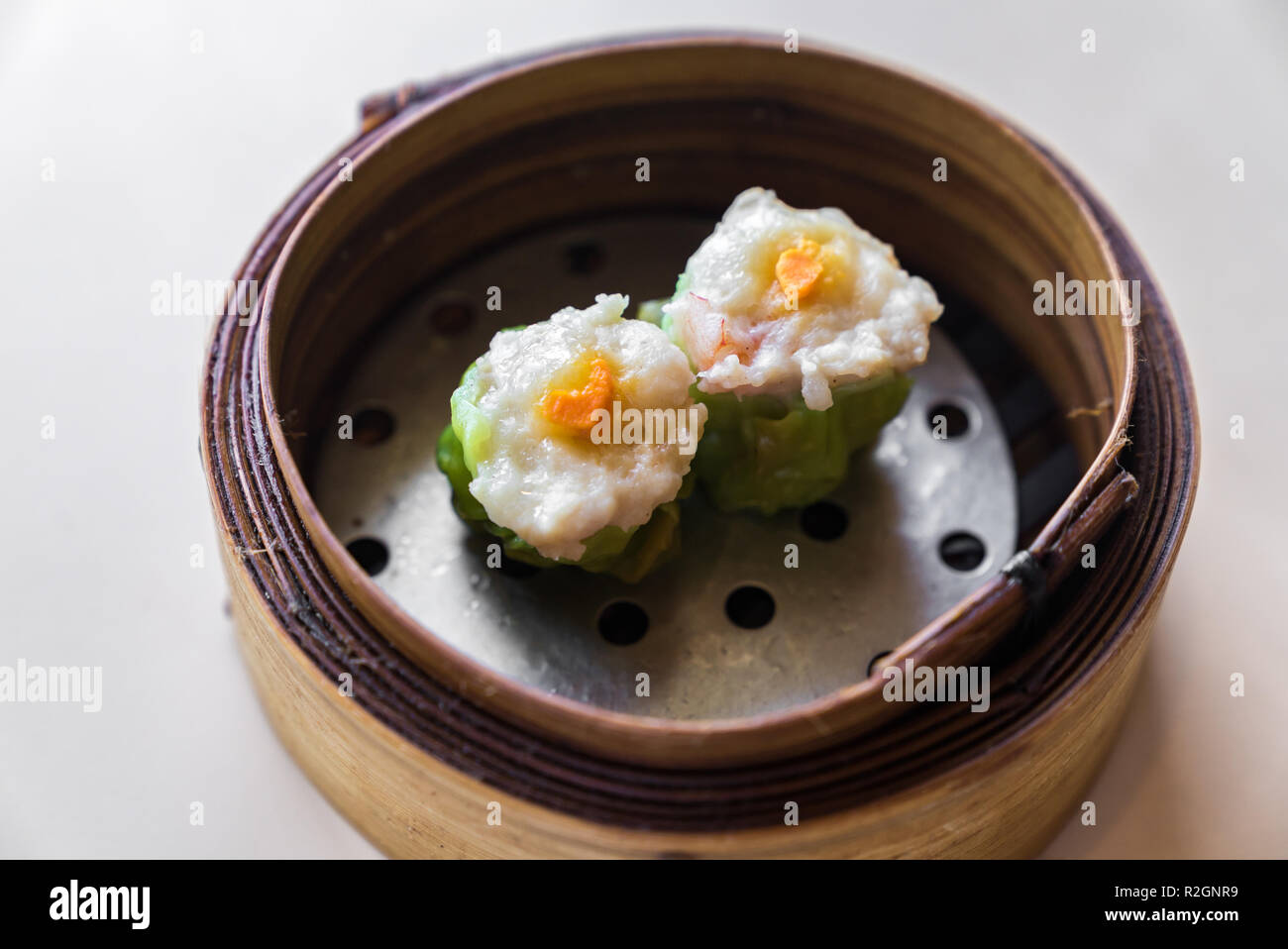 Chinese dim sum in wooden basket Stock Photo - Alamy