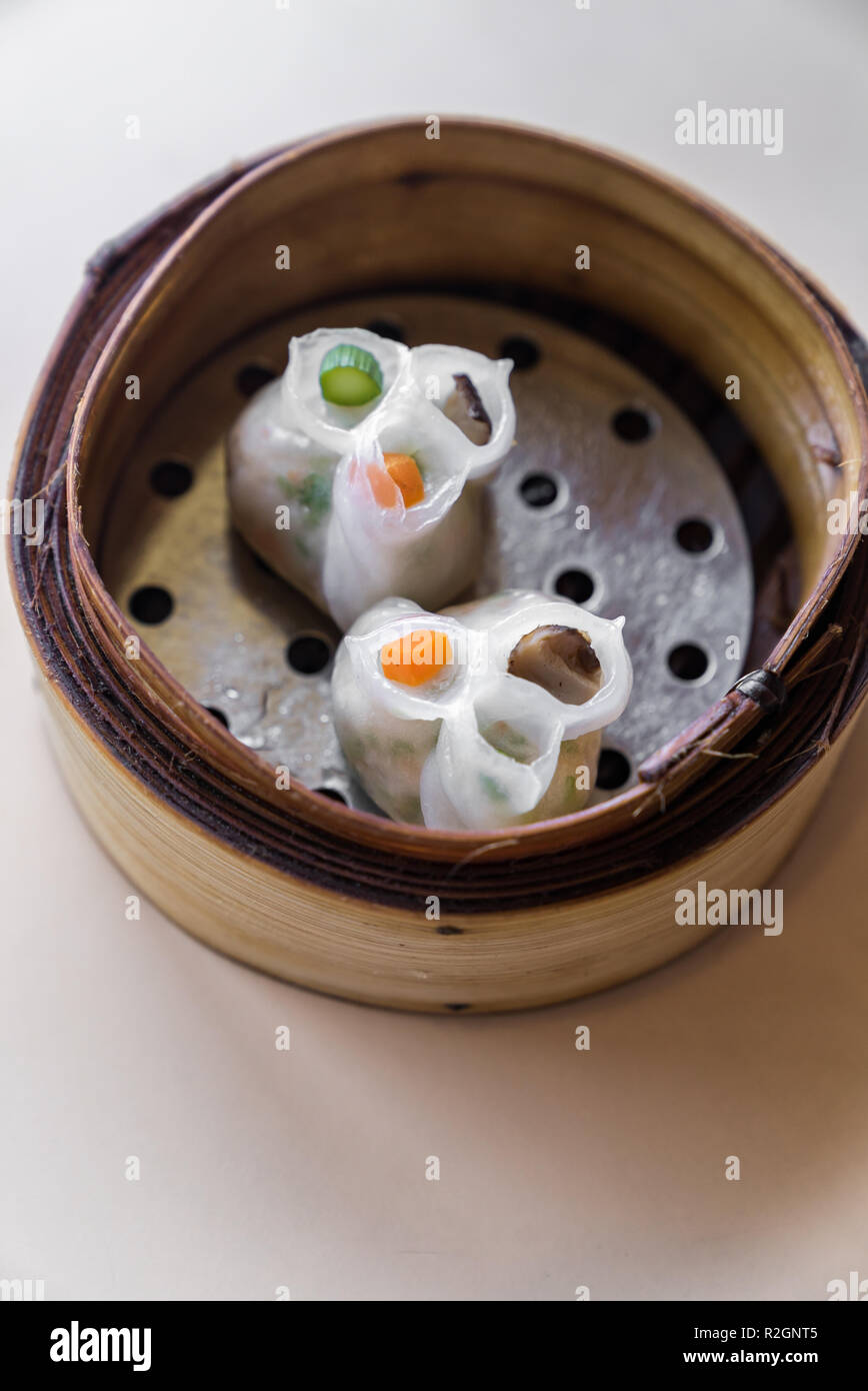 Chinese dim sum in wooden basket Stock Photo - Alamy