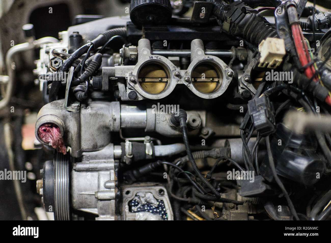 Legendary modern sport engine in car with open hood and raw parts Stock ...