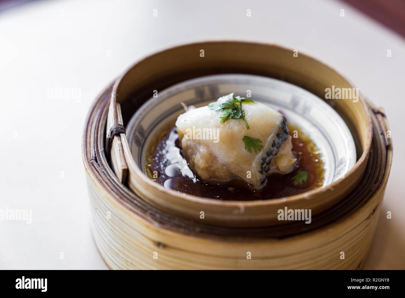 Chinese dim sum in wooden basket Stock Photo - Alamy