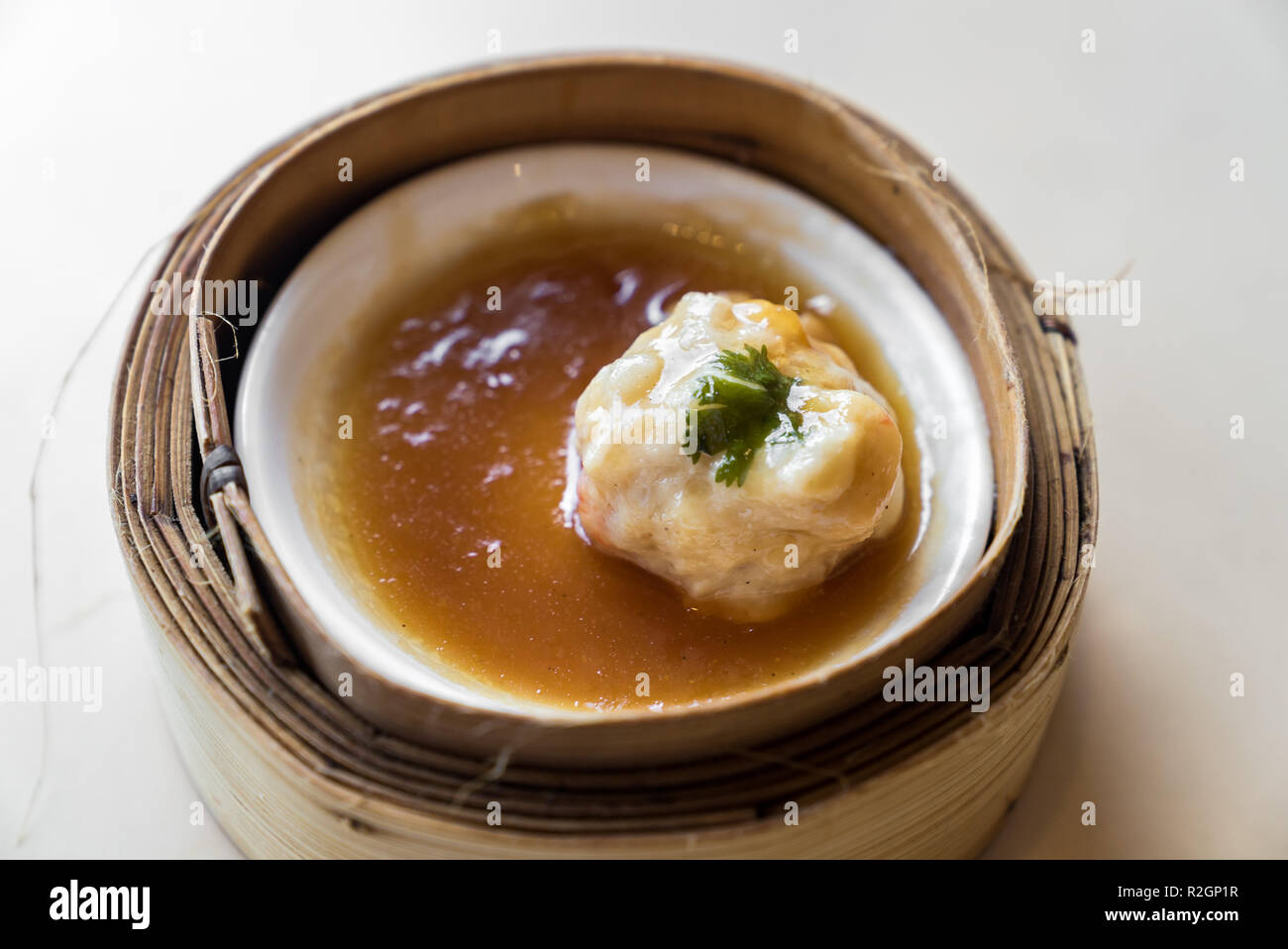 Chinese dim sum in wooden basket Stock Photo - Alamy