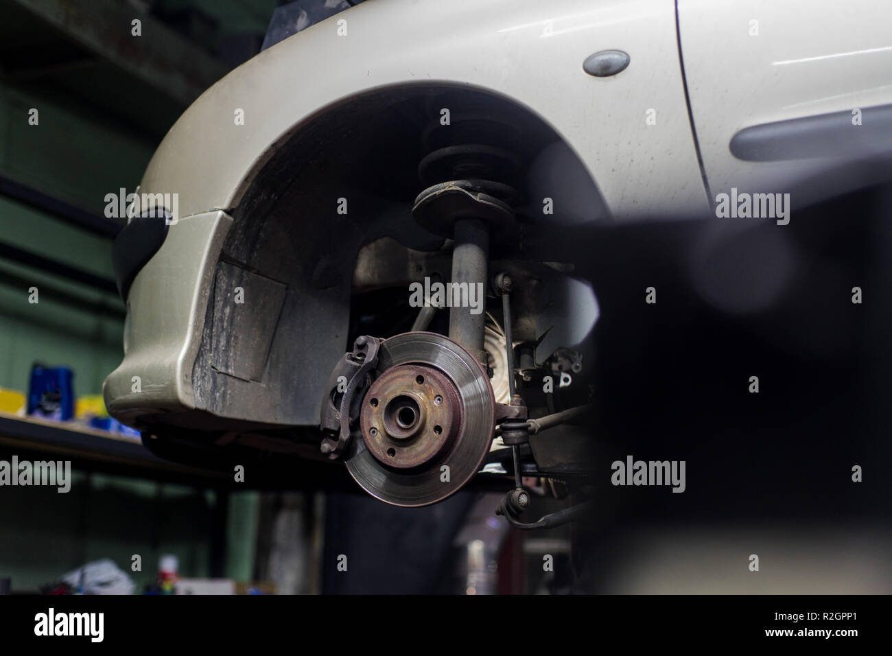 Car without tire hi-res stock photography and images - Alamy