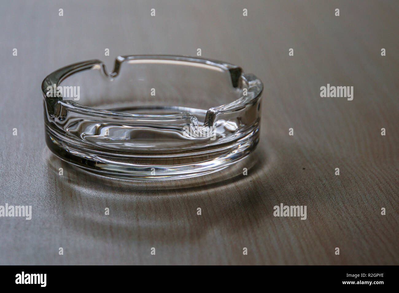 Transparent Glass Ashtray Stock Photo - Alamy