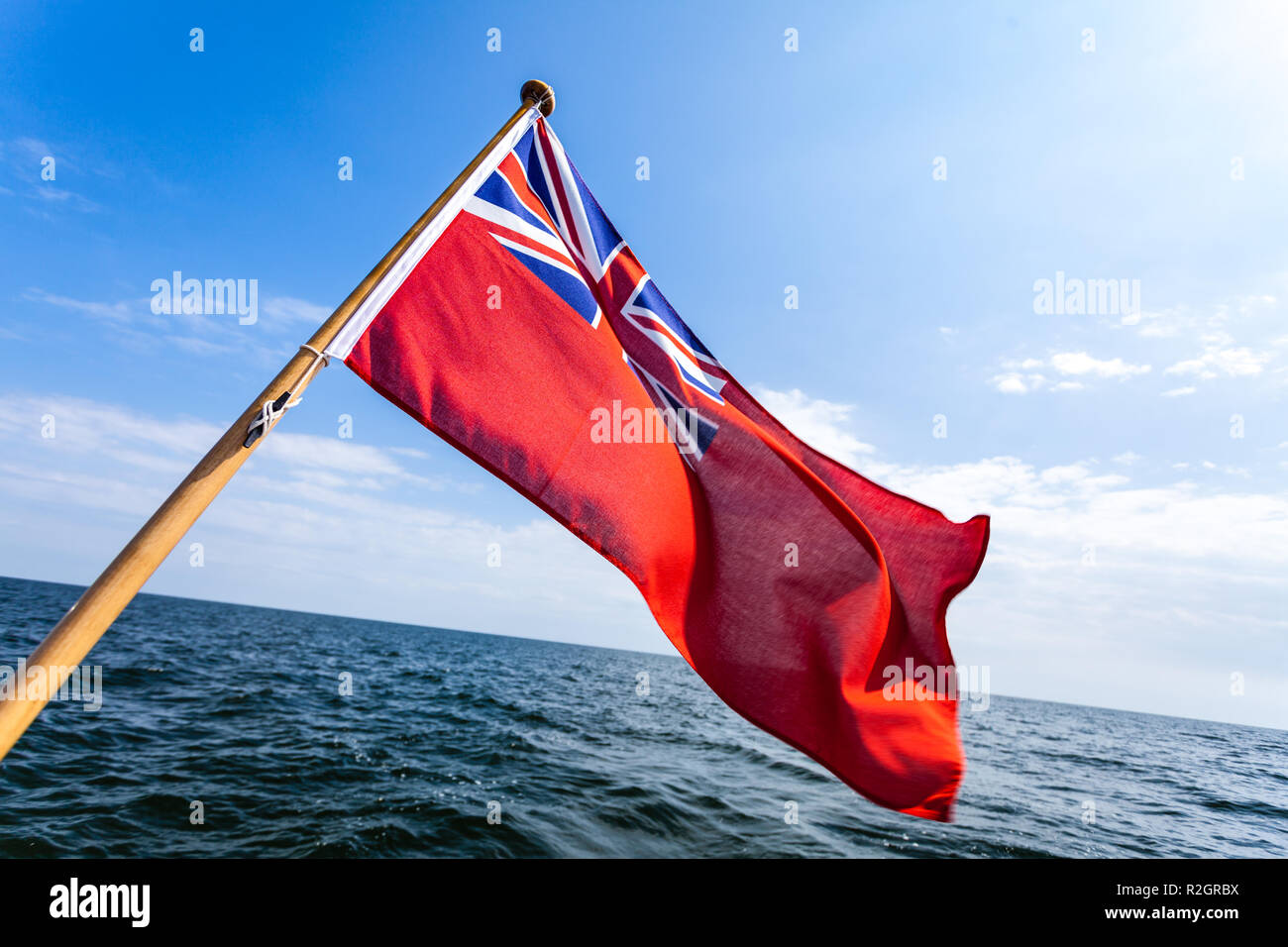 The uk red ensign the british maritime flag flown from yacht sail boat ...