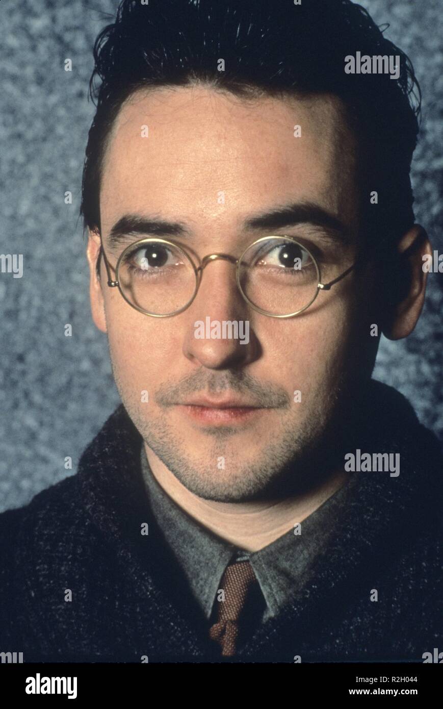 Man round glasses 1920s hi-res stock photography and images - Alamy