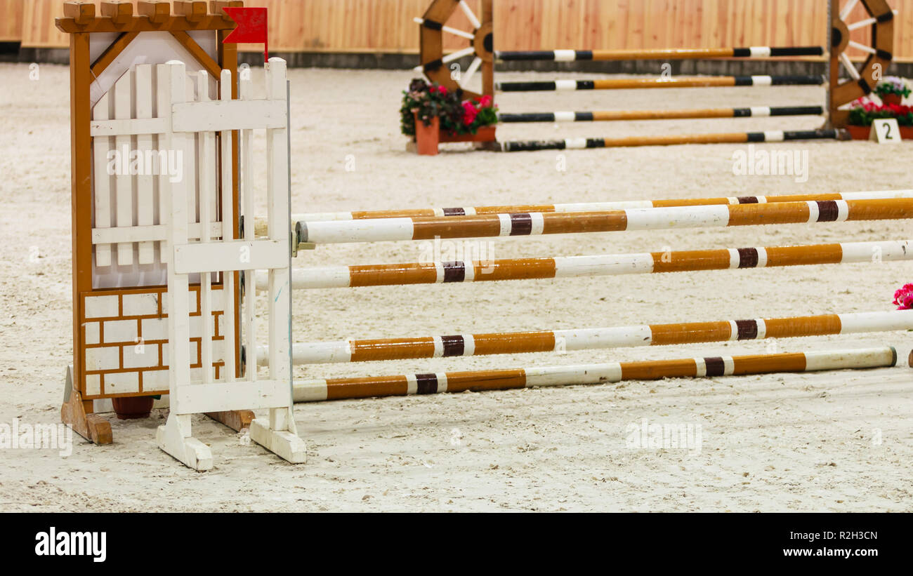 Equitation. Obstacle for jumping horses. Riding competition Stock Photo ...