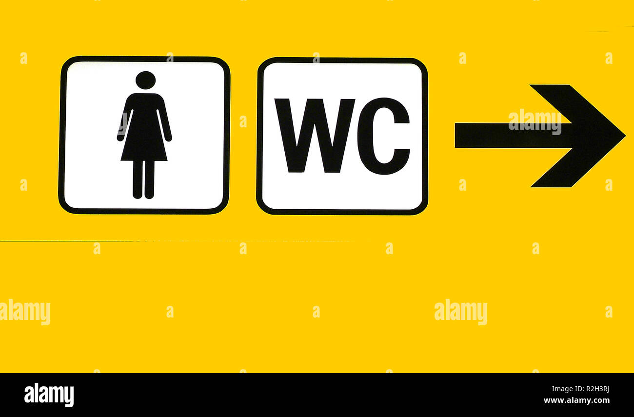 wc yellow woman Stock Photo - Alamy