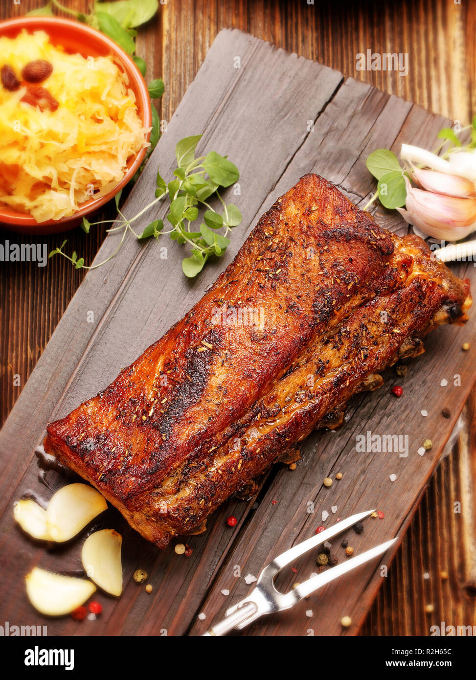 Rosted ribs with spices on wooden board Stock Photo - Alamy
