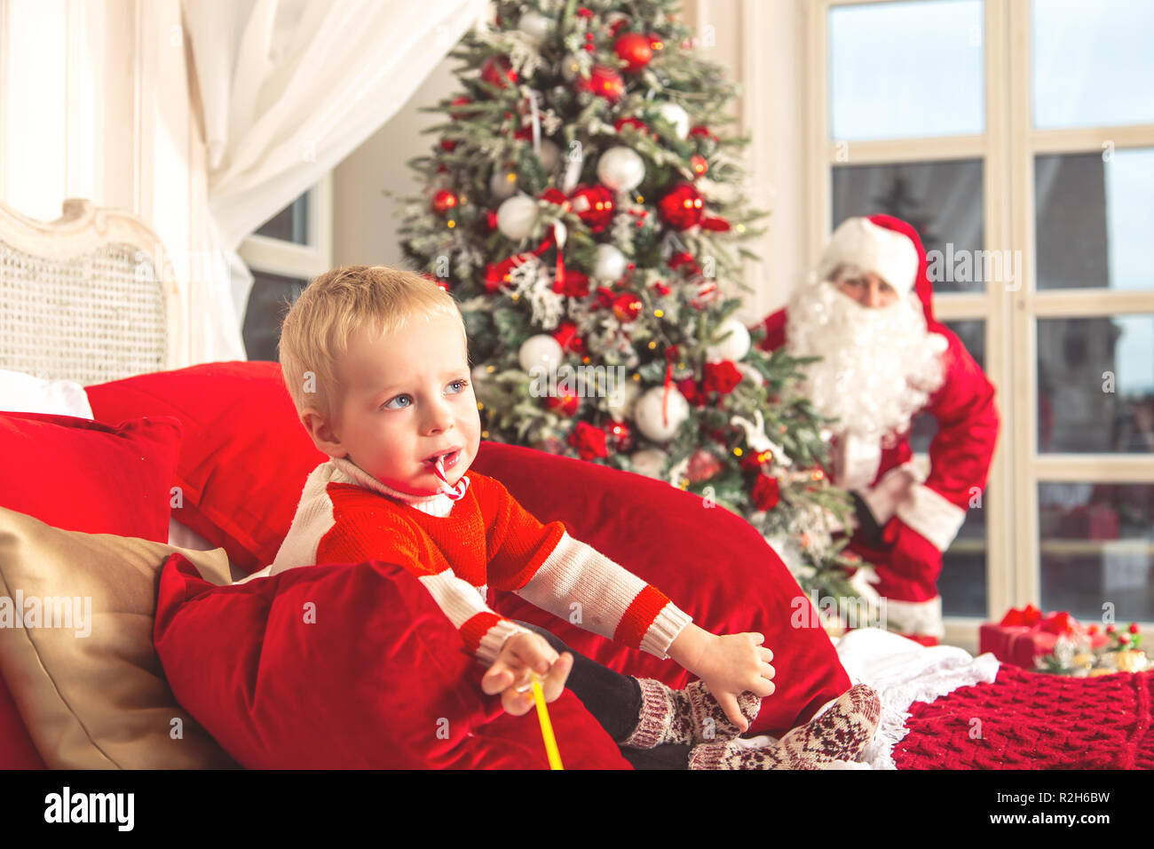 Santa Behind The Tree High Resolution Stock Photography and Images - Alamy