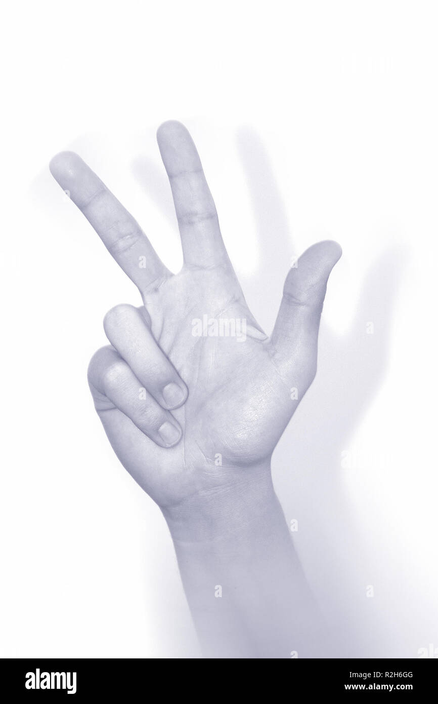 hand in three finger position Stock Photo - Alamy