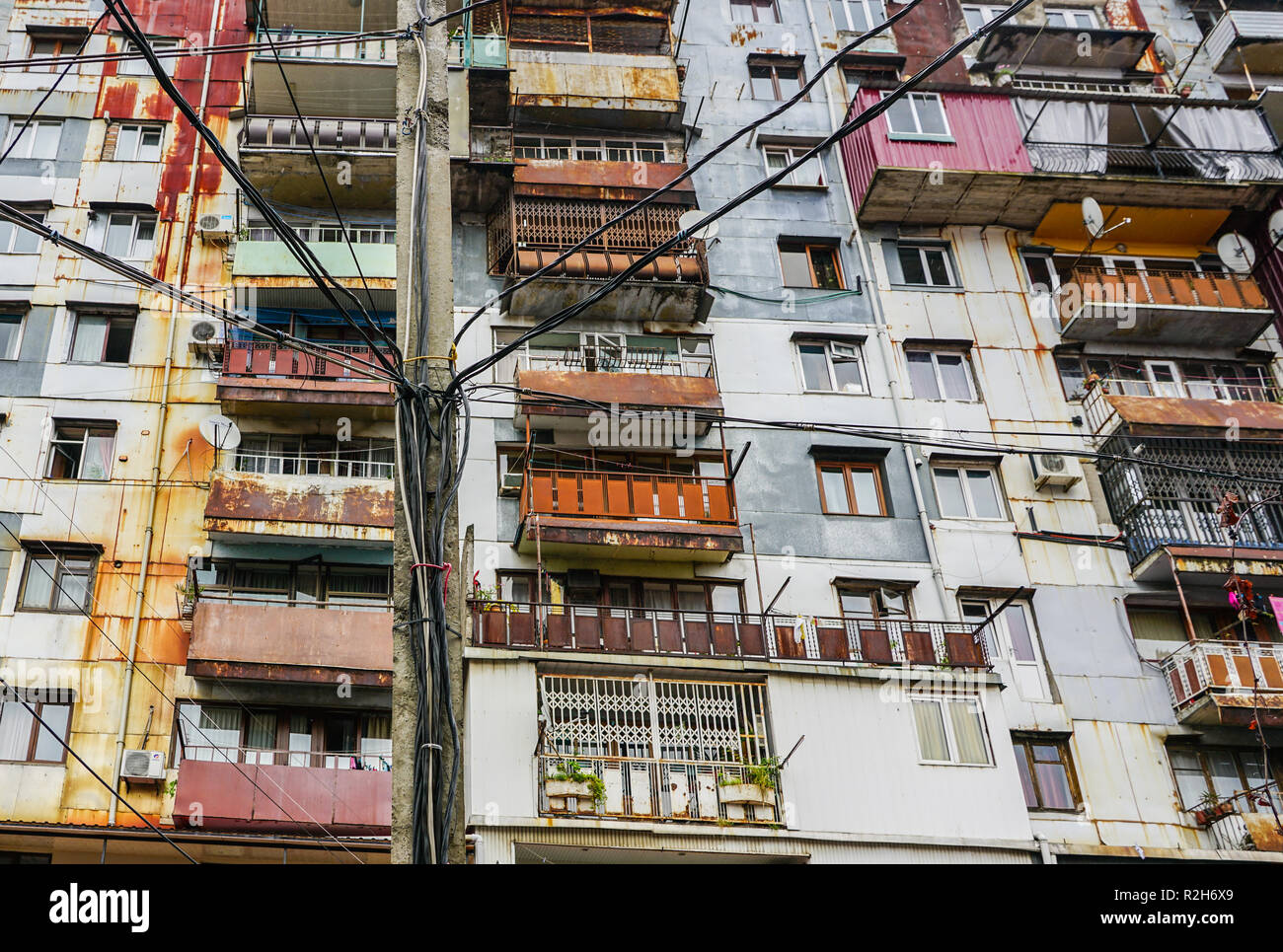 poor suburban block of flats, construction, balcony Stock Photo - Alamy