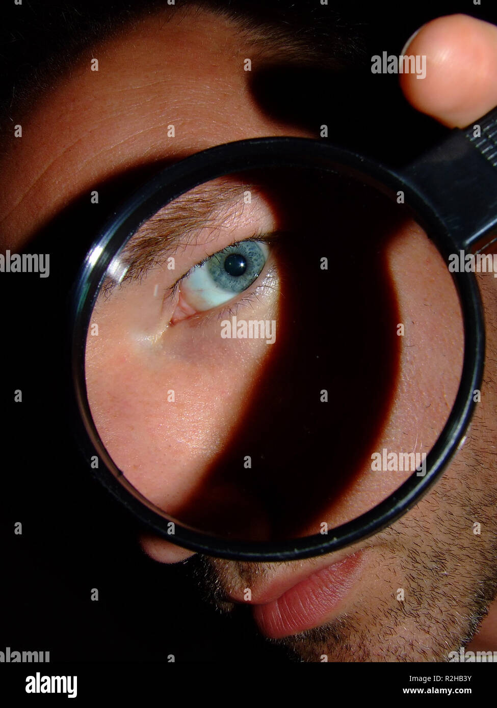 through the magnifying glass Stock Photo - Alamy