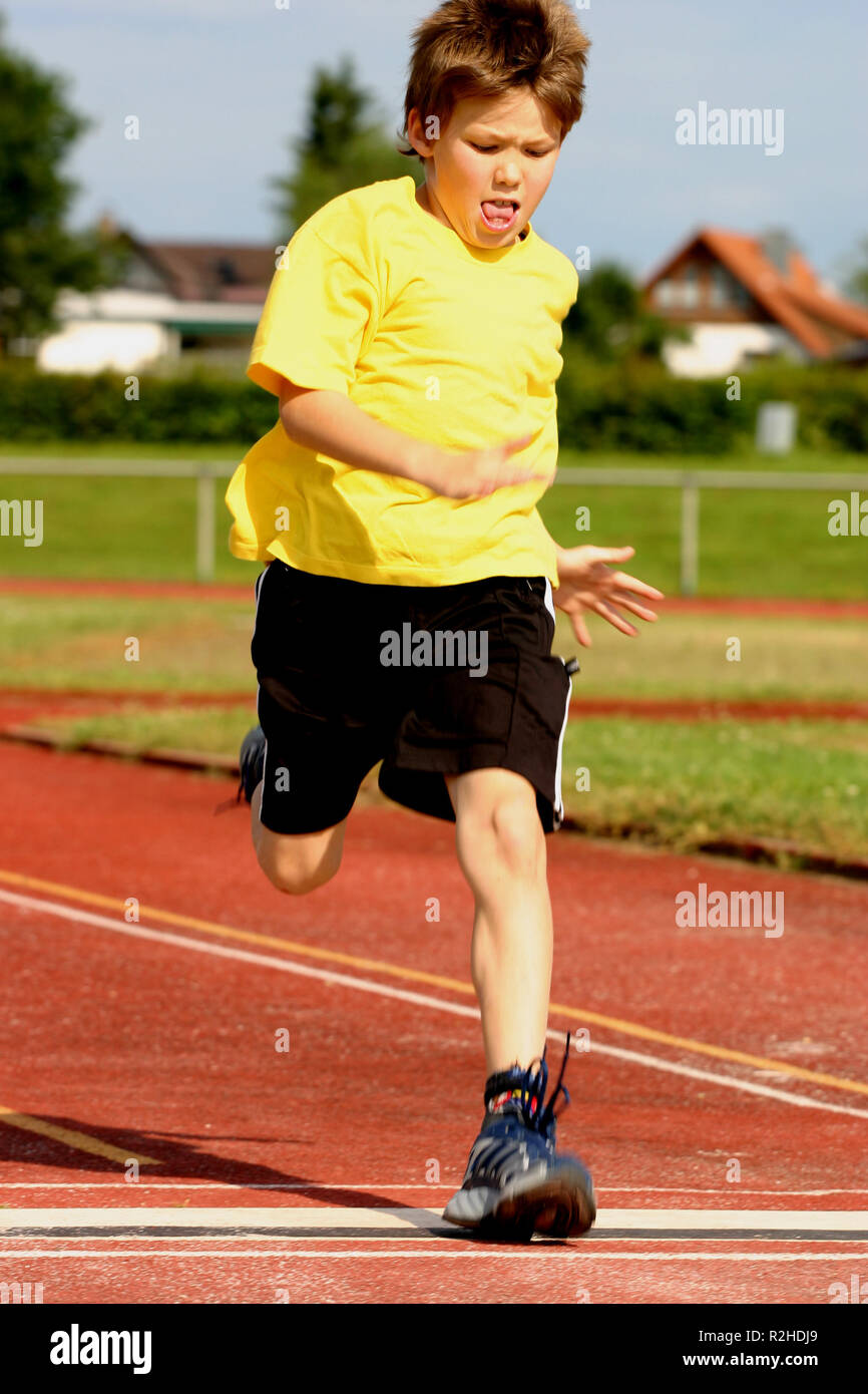 Child jumping up athletics hi-res stock photography and images - Alamy