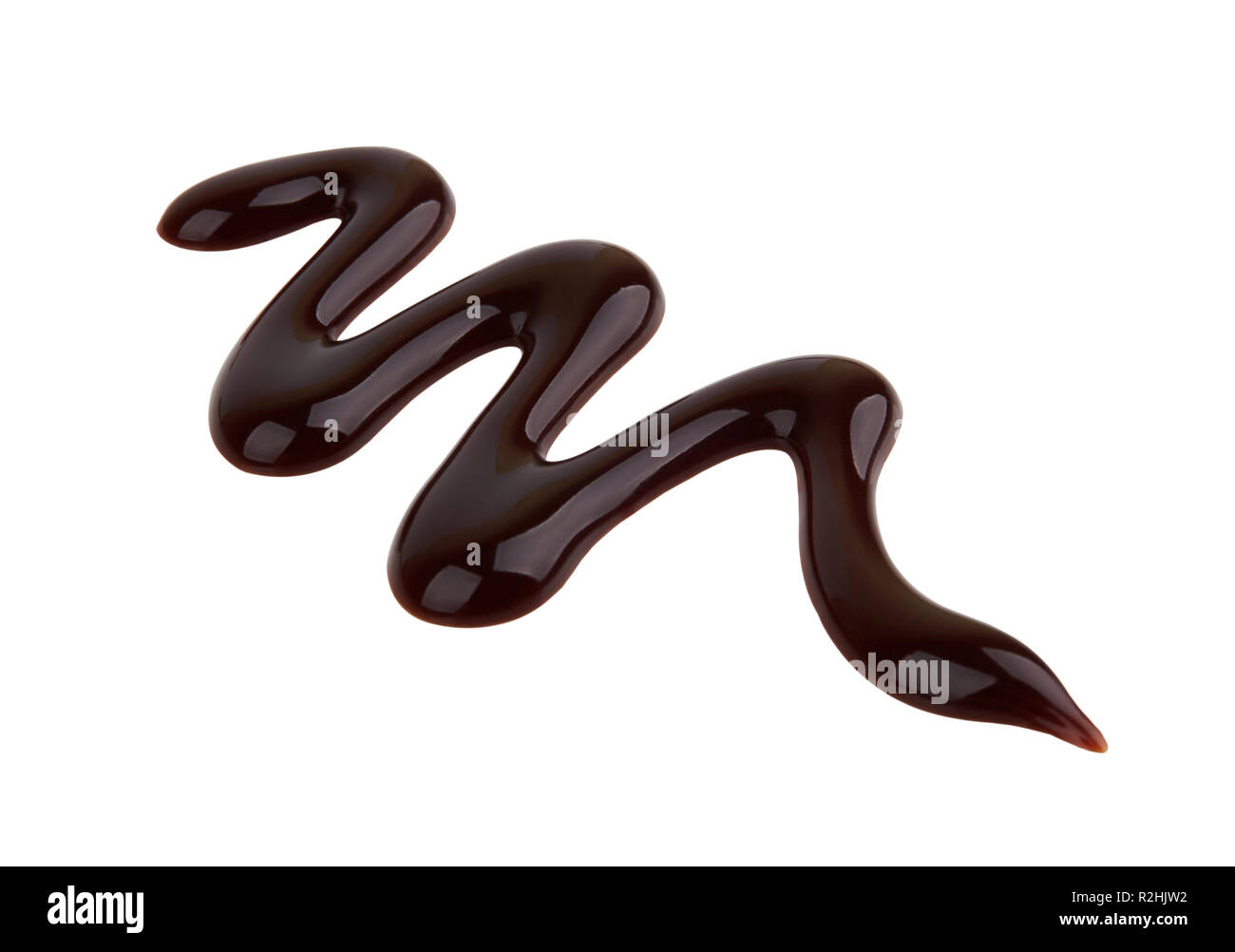 Chocolate syrup isolated on a white background Stock Photo - Alamy
