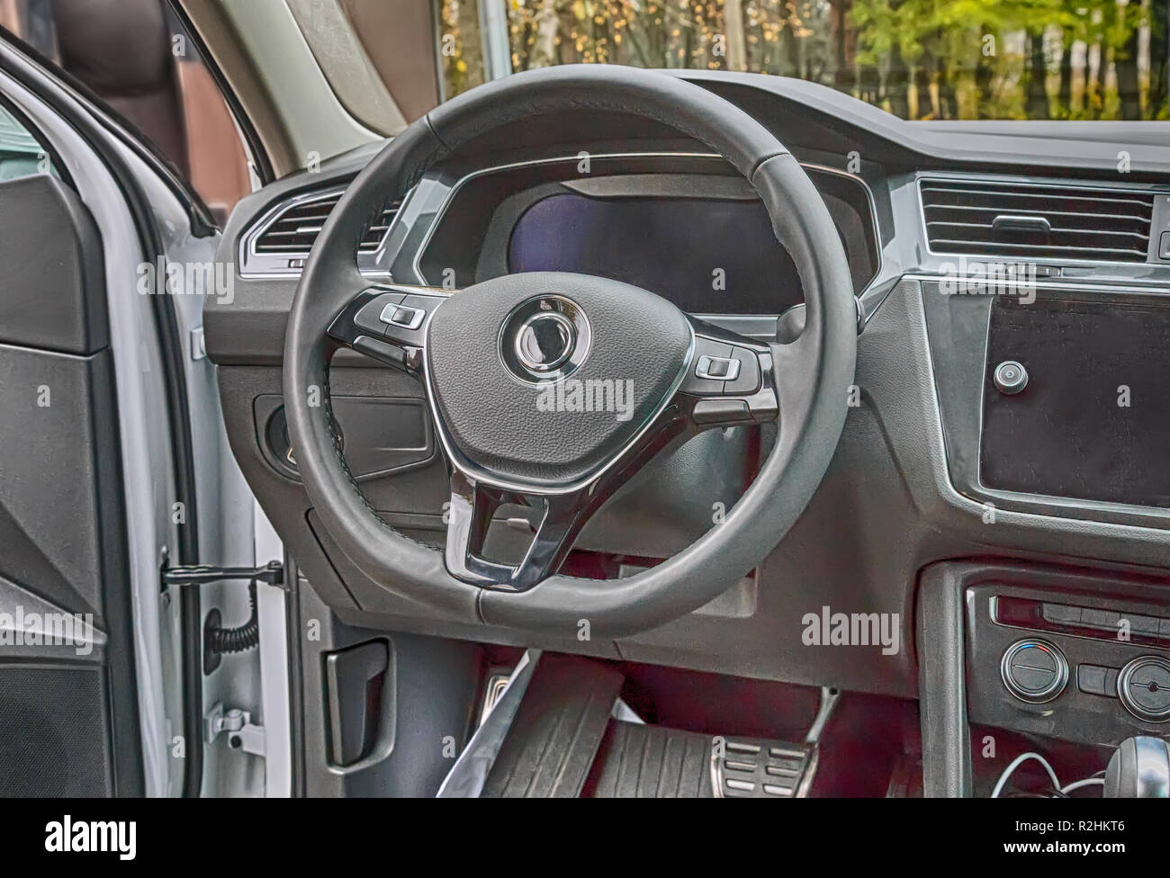 Interior of the car interior with steering wheel and control devices ...