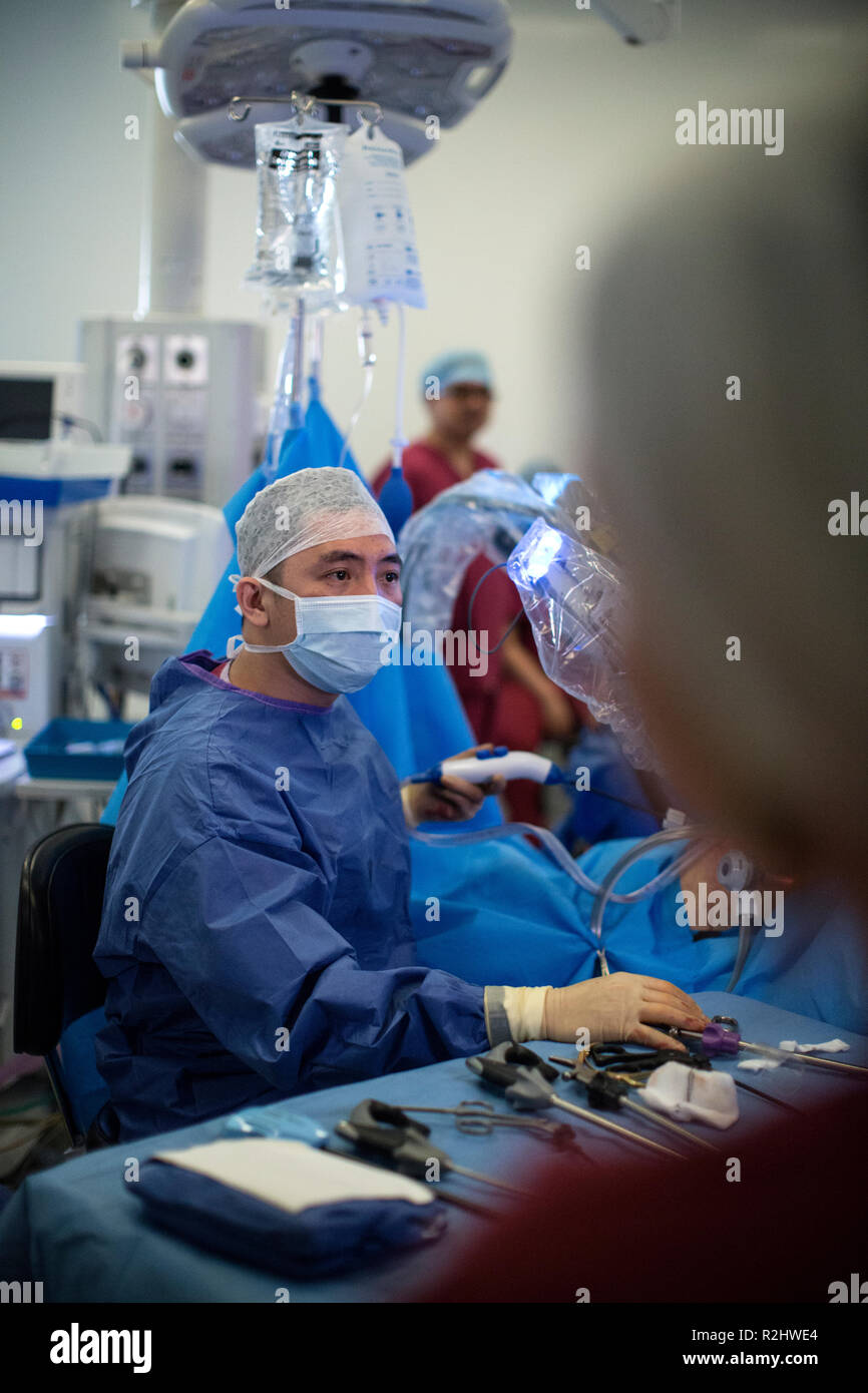 Robotic surgeon da Vinci Xi robot operating a surgical procedure of ...