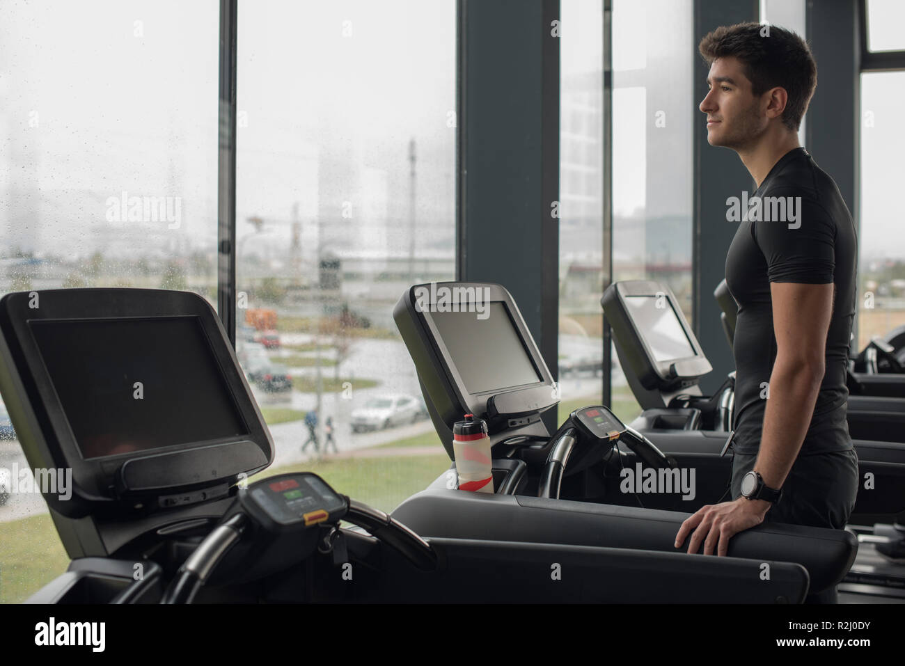Person on running machine hi-res stock photography and images - Alamy