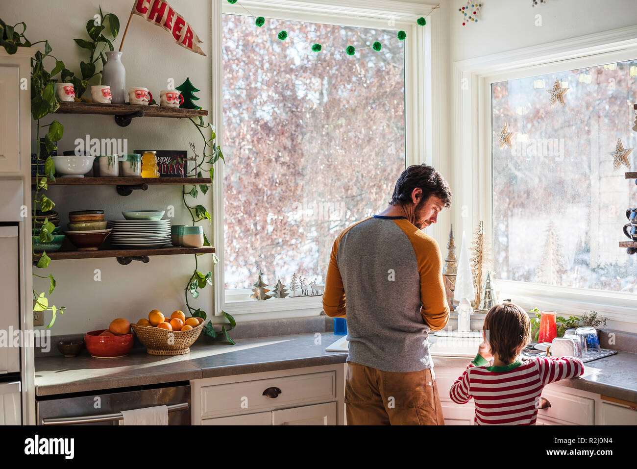 Children washing up hi-res stock photography and images - Alamy