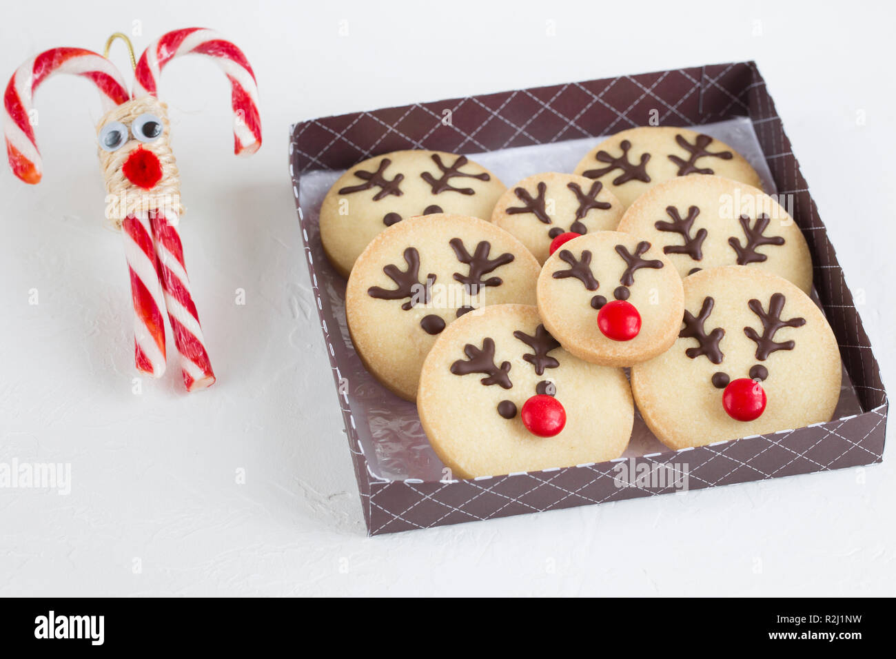Homemade reindeer cookies and candy canes Stock Photo - Alamy