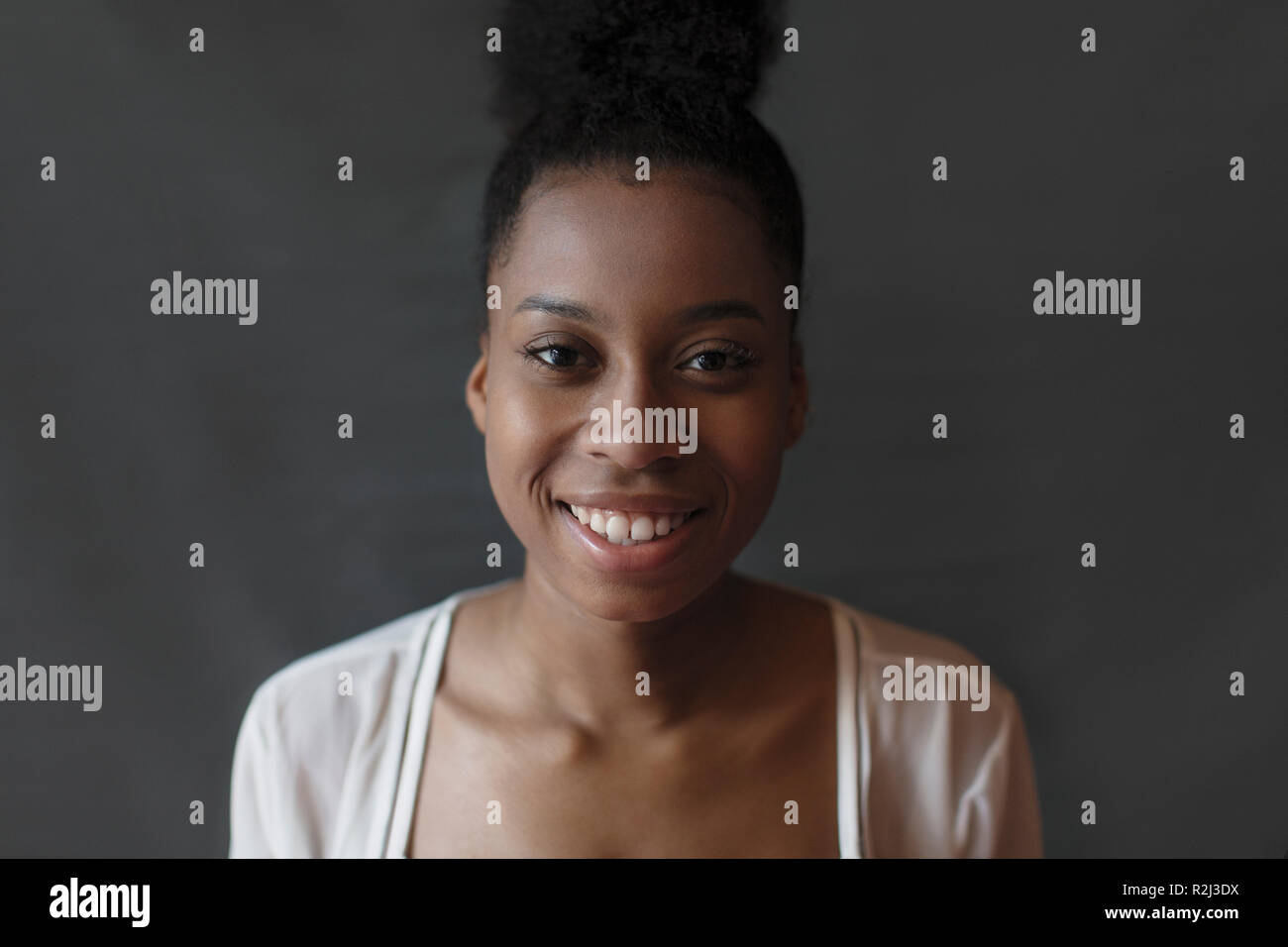 Portrait smiling, confident young woman Stock Photo - Alamy Portrait smiling, confident young woman Stock Photo - Alamy