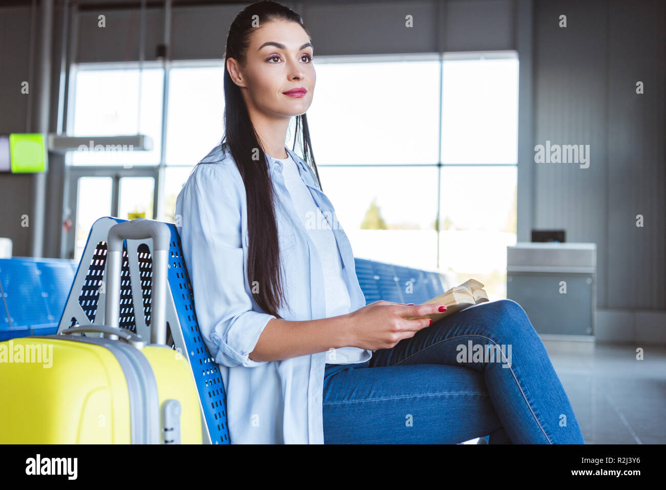 Beautiful girl brunette airport hi-res stock photography and images - Alamy