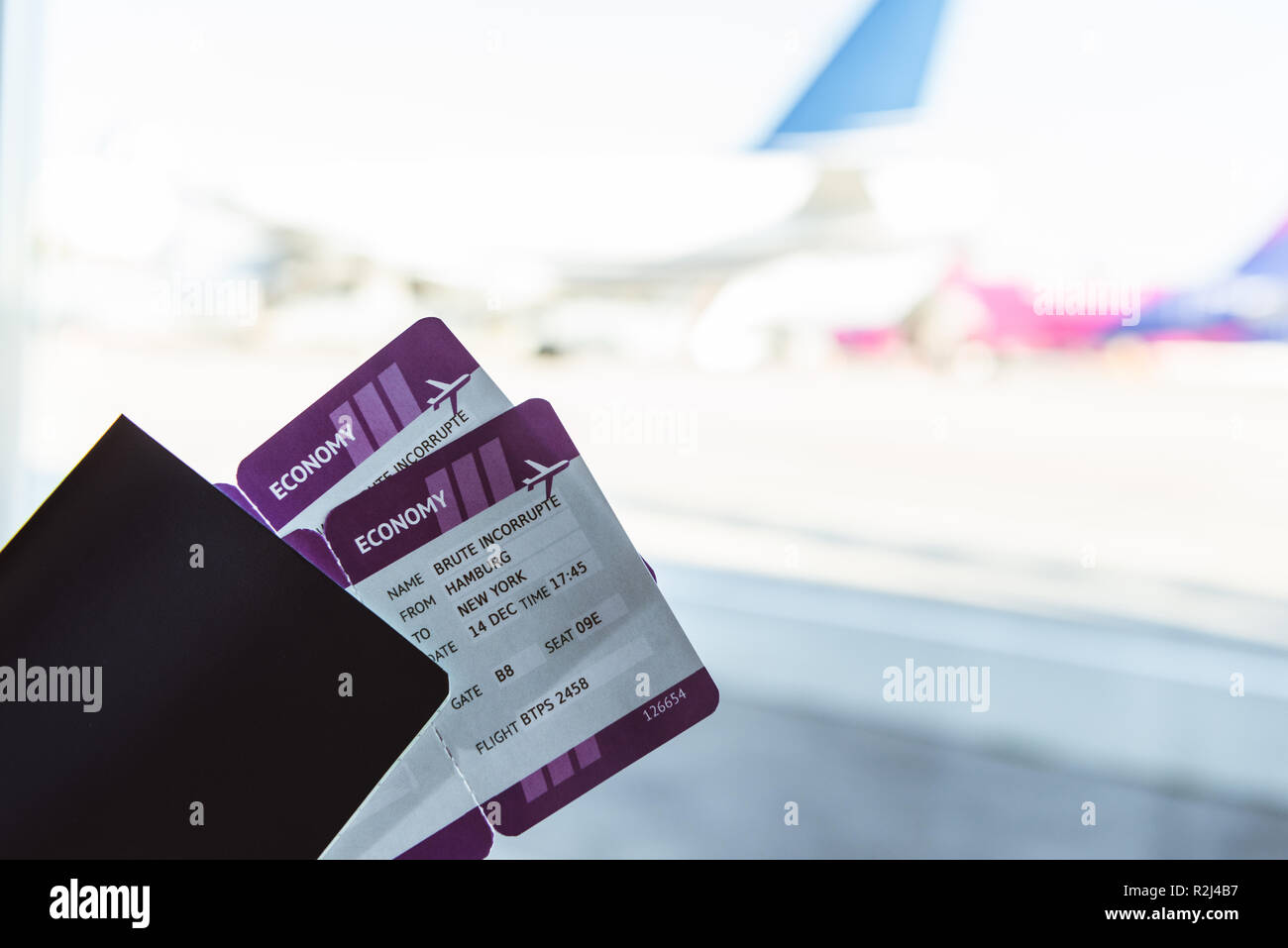 close up of air tickets and travel bag in airport Stock Photo - Alamy