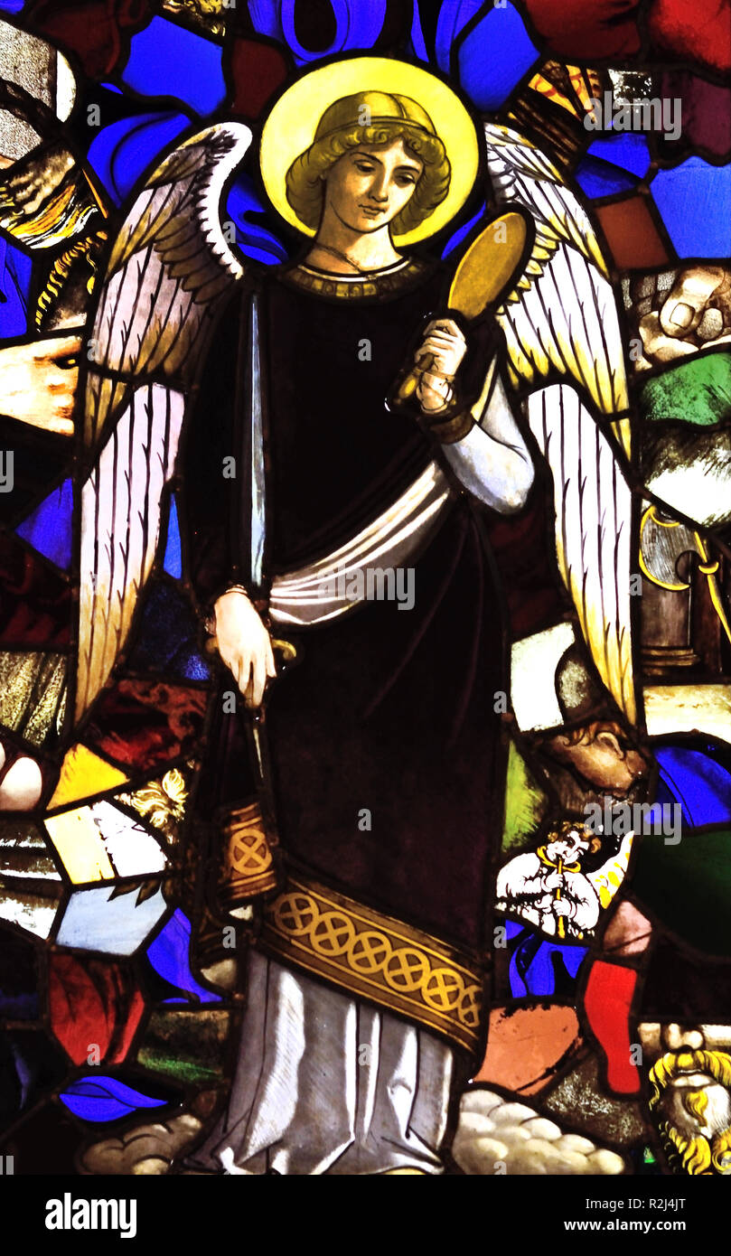 Cathedral's stained glass windows: a large Angel in prayer and an Angel ...