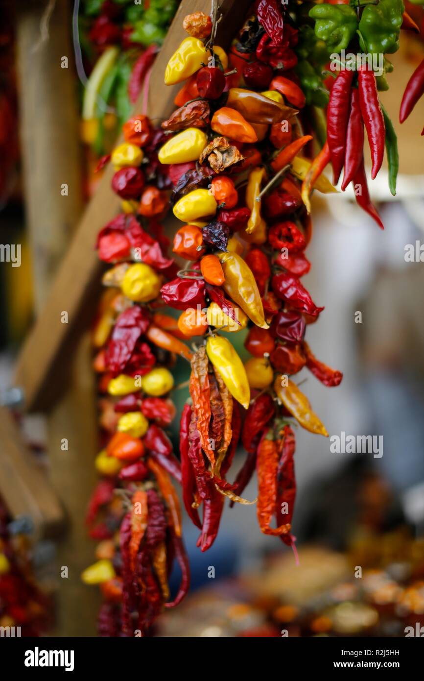 String of multi coloured chillis hi-res stock photography and images ...