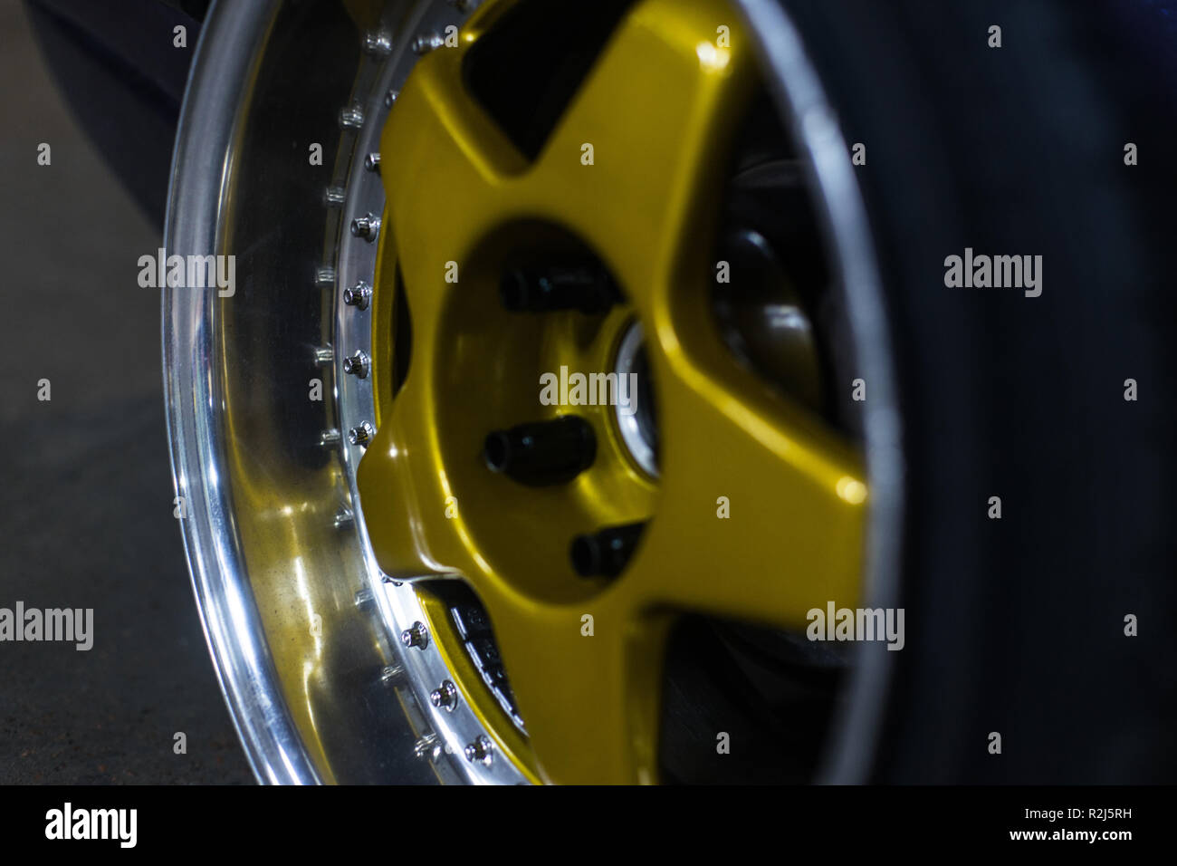 Legendary alloy two-piece sport rims on beautiful wheels in polished ...