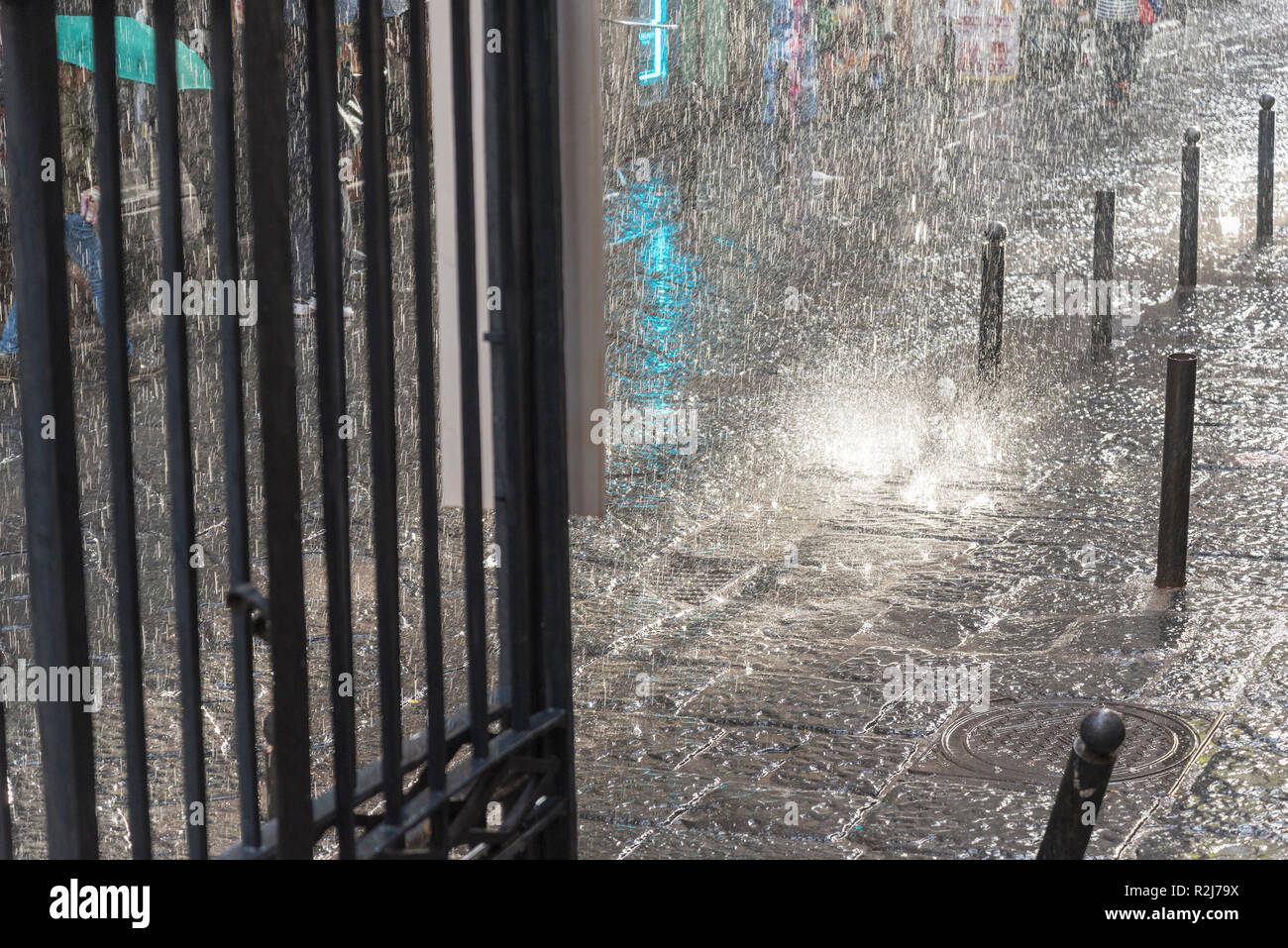 Rain, blurring and large drops of strong water flow. Blurred rain ...