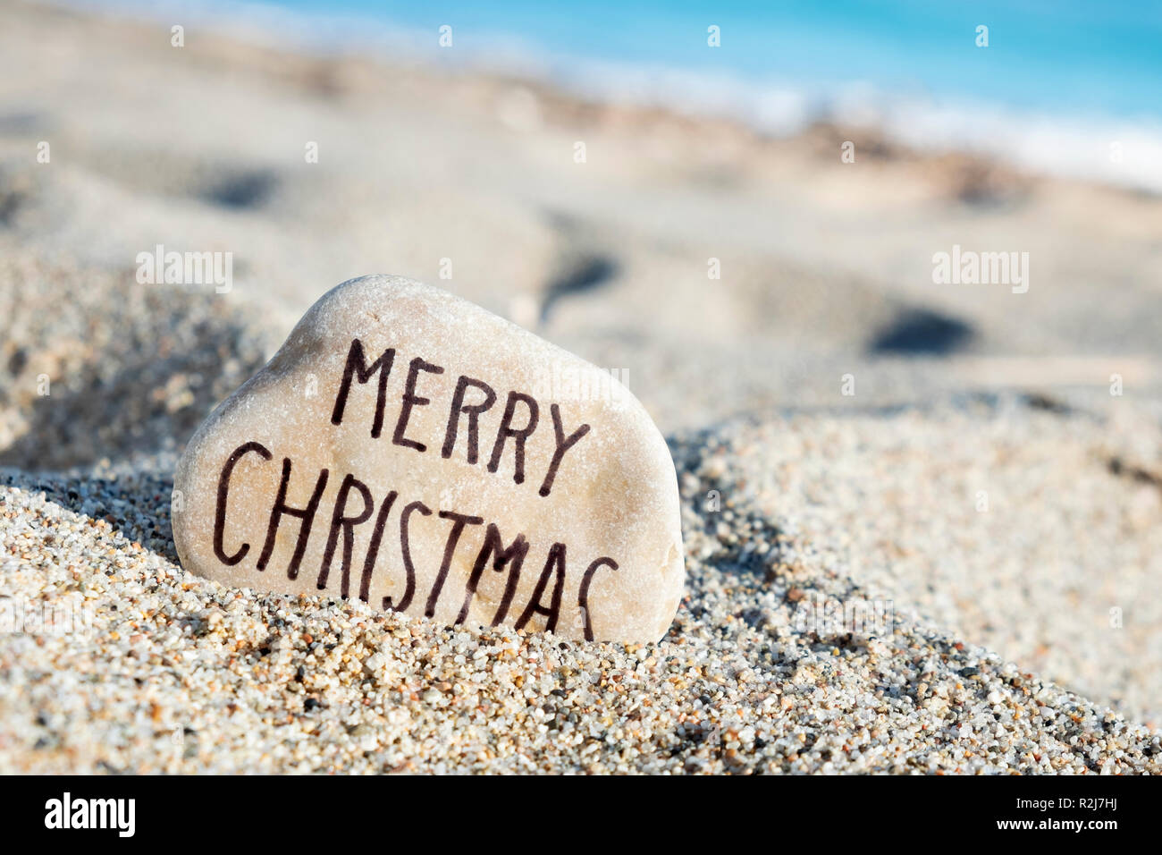 Merry christmas written on a beach hi-res stock photography and images ...