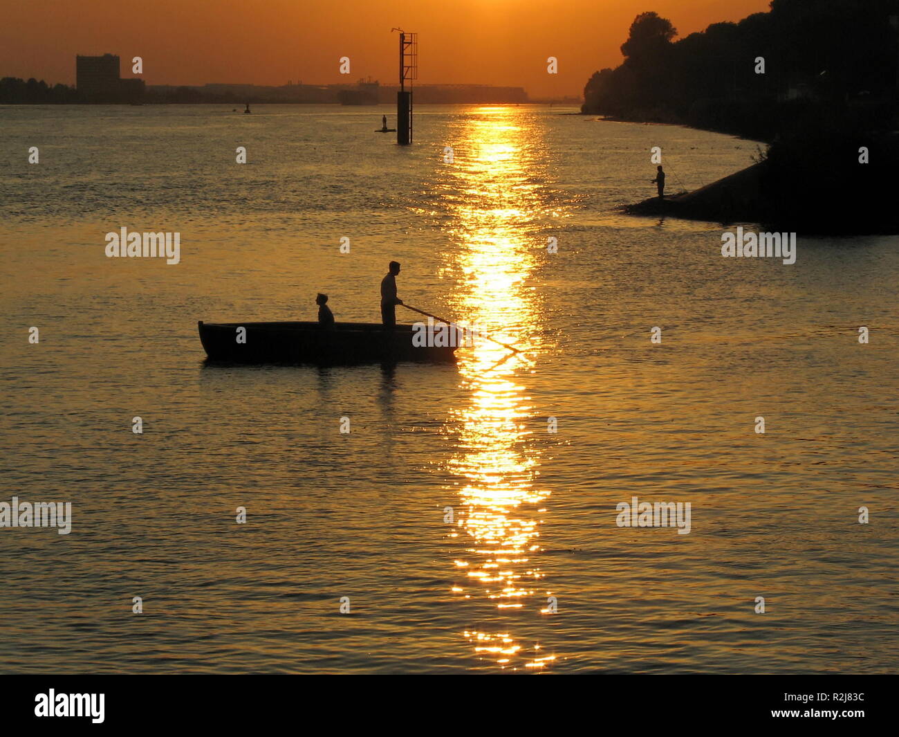 Â fishing in sunset 3 Stock Photo - Alamy