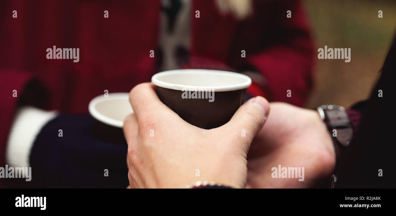 Female hands holding cups hi-res stock photography and images - Alamy