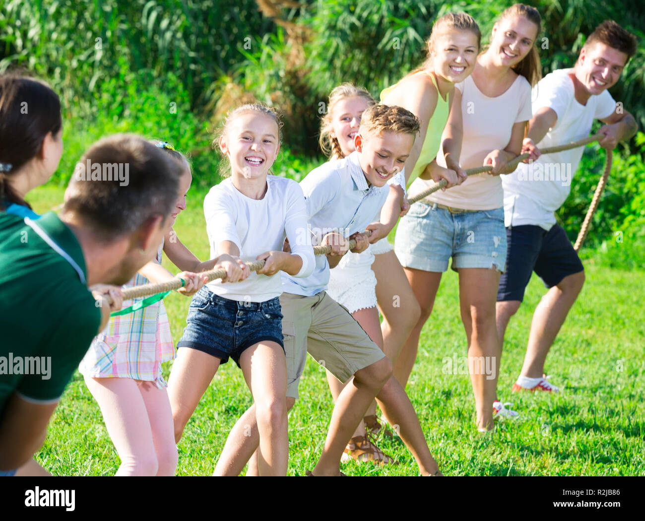 Brother sister playing tug war hi-res stock photography and images - Alamy