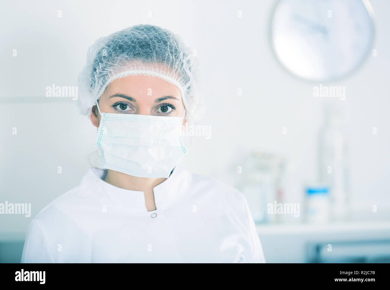 Young female nurse ready to receive patients in hospital Stock Photo ...