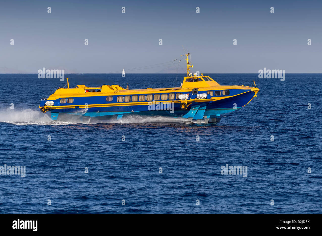 Fast ferry boat in the see, used to carry passengers and cargo Stock ...