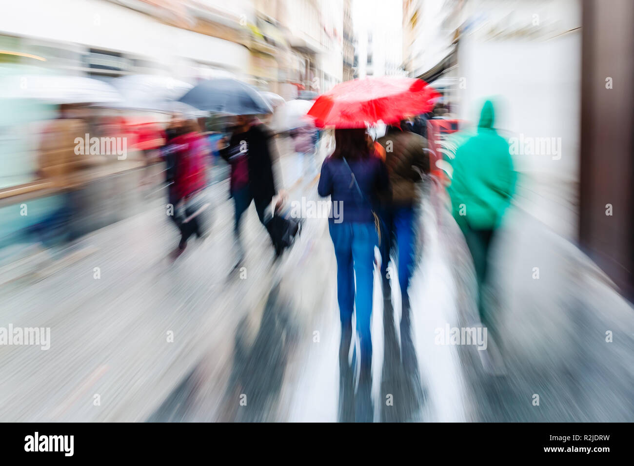 picture of a crowd of people walking in the rainy city with camera made ...