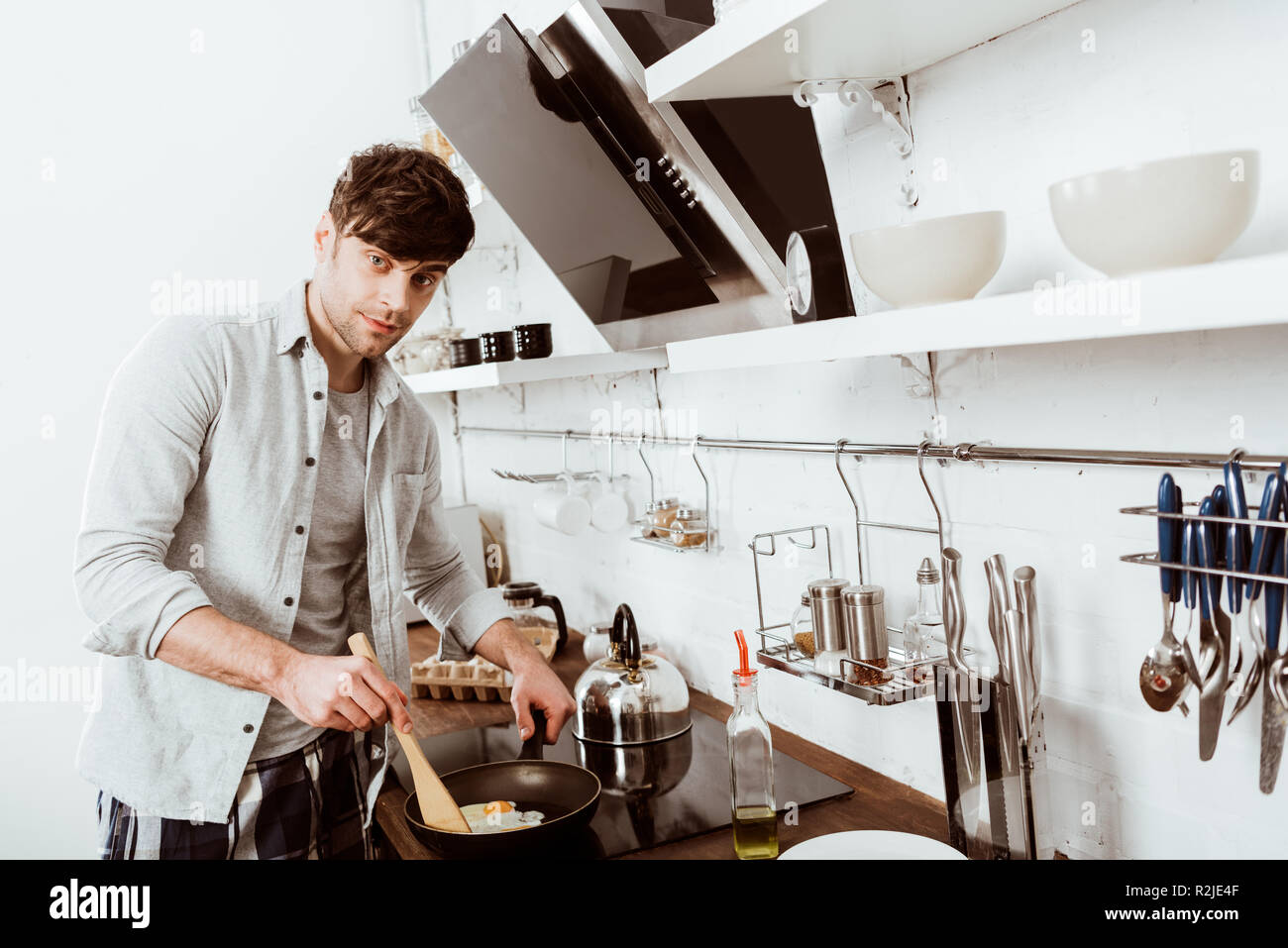 Person making scrambled eggs hi-res stock photography and images - Alamy
