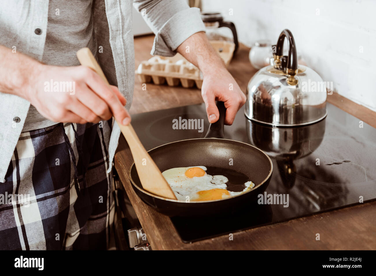 Person making scrambled eggs hi-res stock photography and images - Alamy