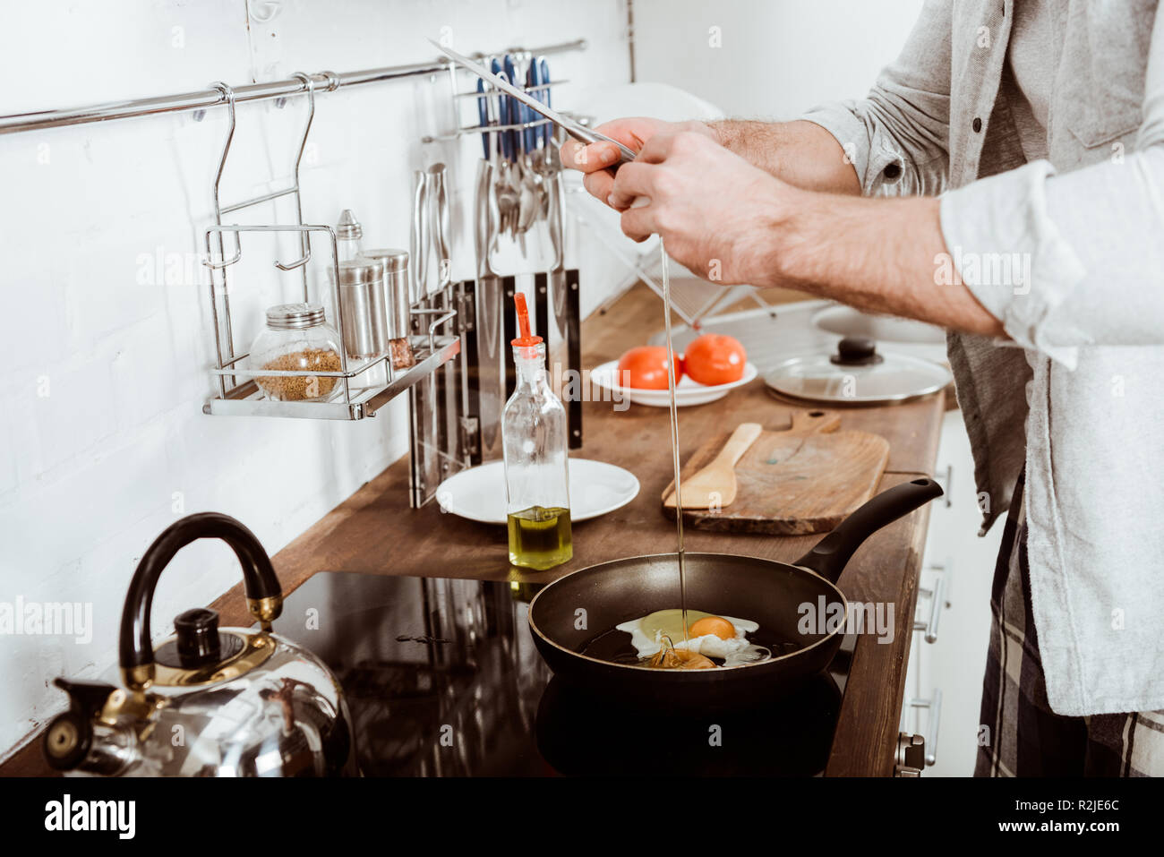 Person making scrambled eggs hi-res stock photography and images - Alamy