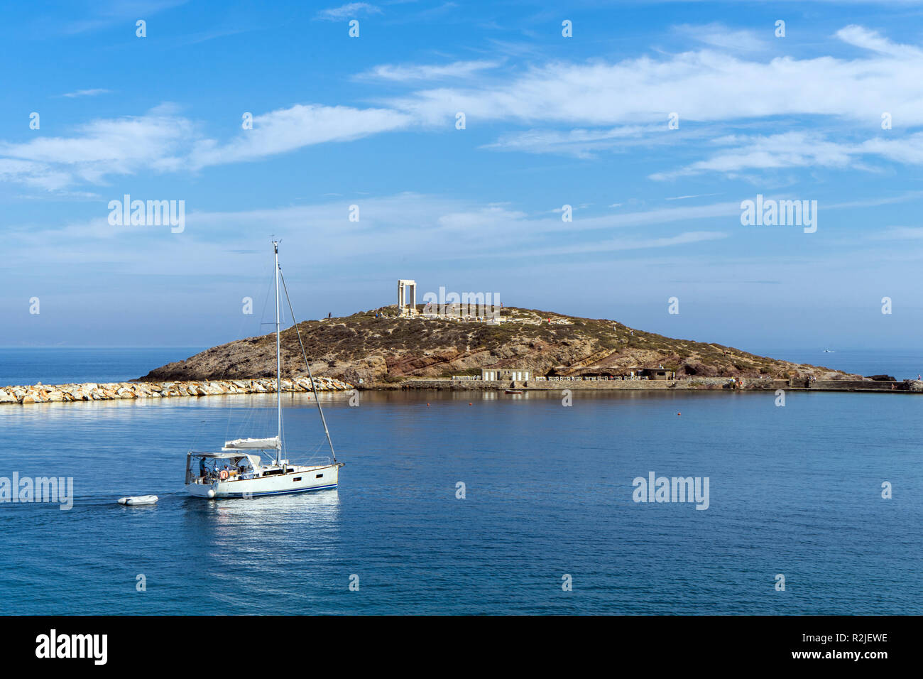 The break water at the port of Naxos island, Greece. At the top of the ...