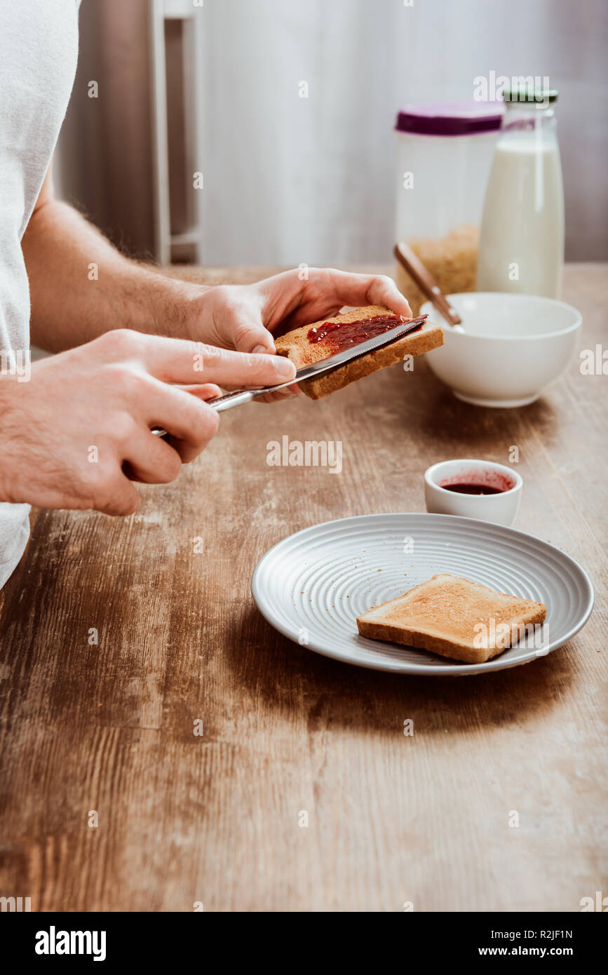 Spreading toast hi-res stock photography and images - Alamy