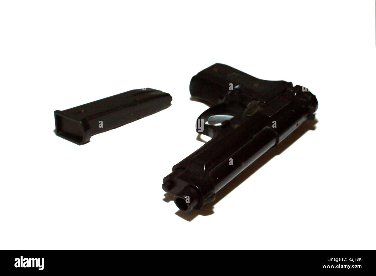 pistol with magazine Stock Photo - Alamy