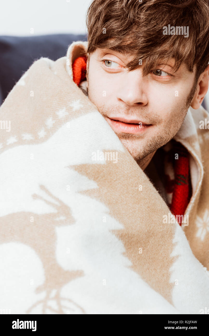 Person wrapped in blanket at home hi-res stock photography and images ...