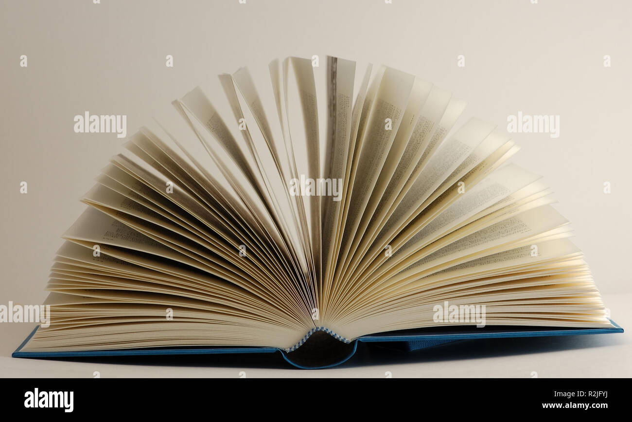opened book isolated on white Stock Photo - Alamy