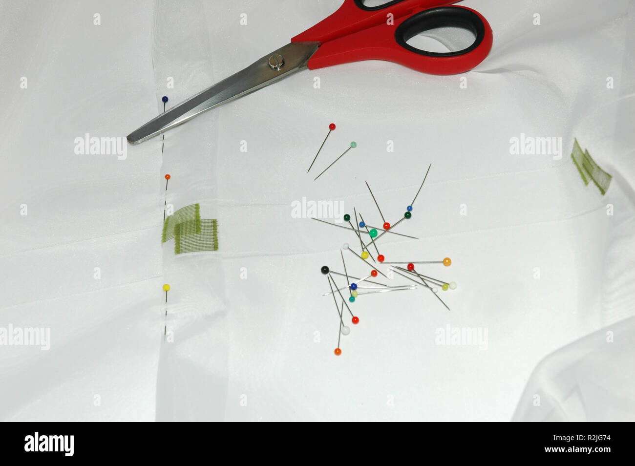 scissors and pins Stock Photo - Alamy