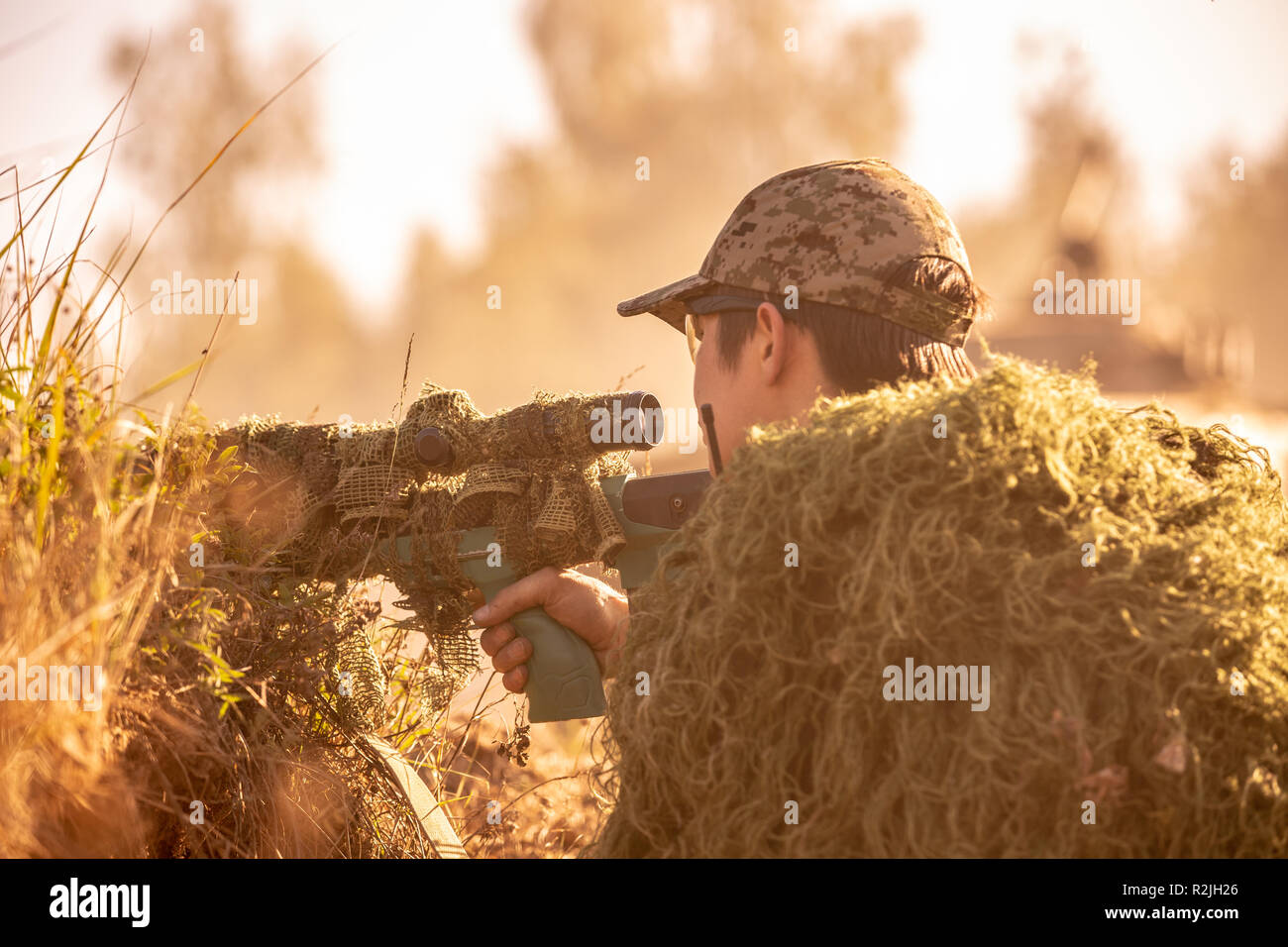Sniper armed with large caliber, sniper rifle, shooting enemy targets ...