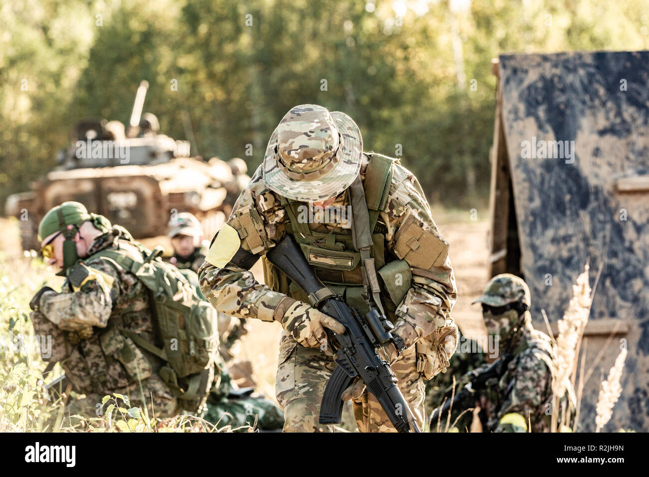 Sniper team armed with large caliber, sniper rifle, shooting enemy ...