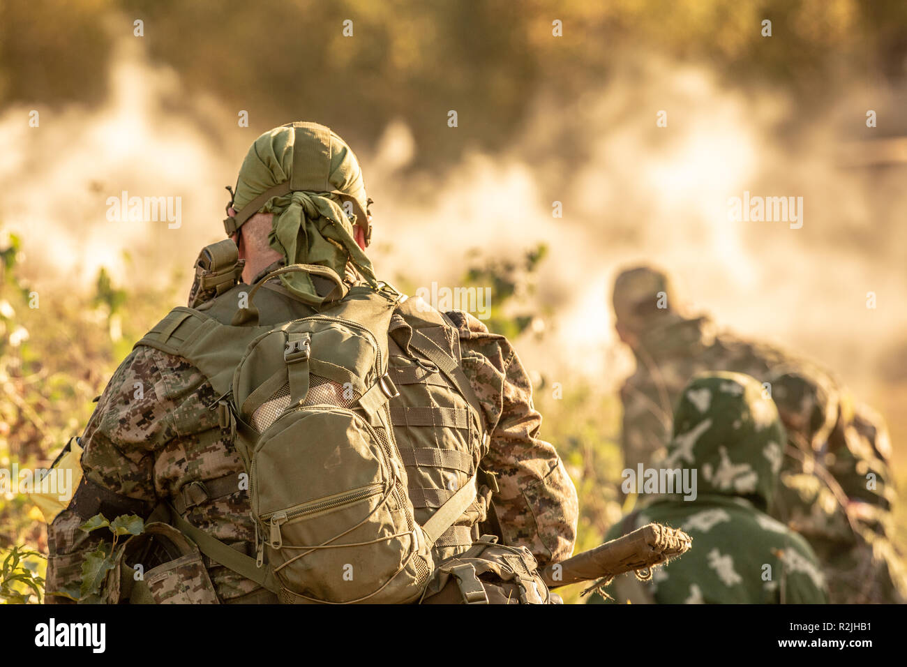 Sniper team armed with large caliber, sniper rifle, shooting enemy ...